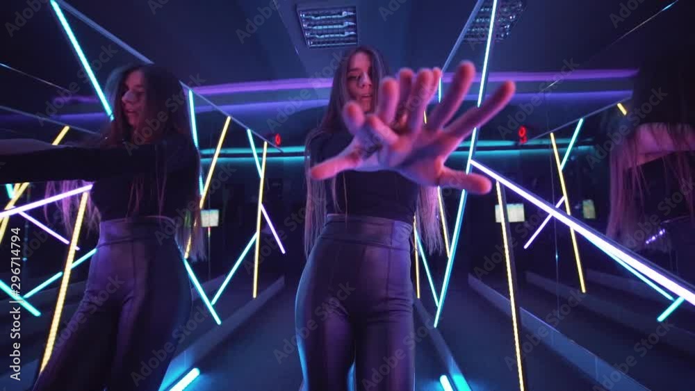 High Fashion model woman in neon lights posing in studio.UV light.Neon ...