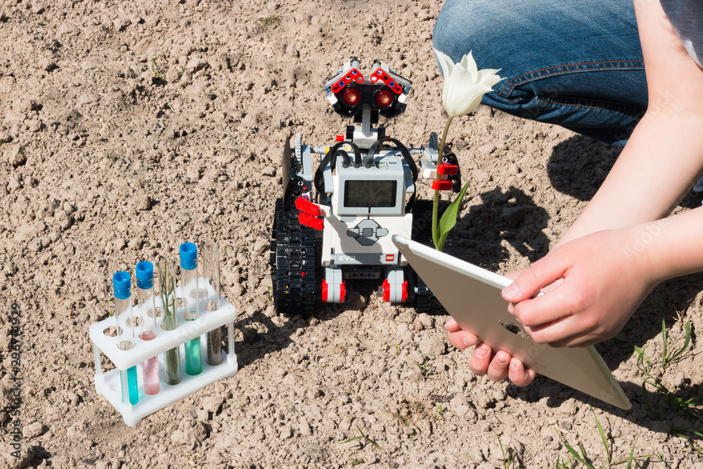 Minsk, Belarus. February, 2017: Teenager schoolboy constructs and ...