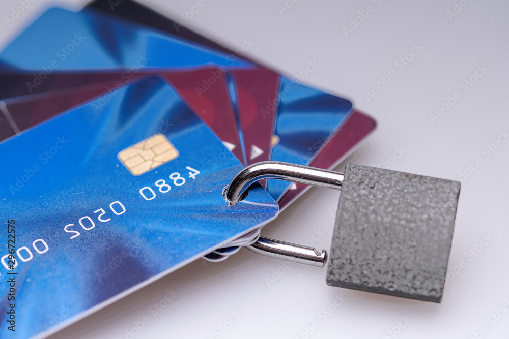 Bank or credit card with pad lock. Safe payment system with chip ...