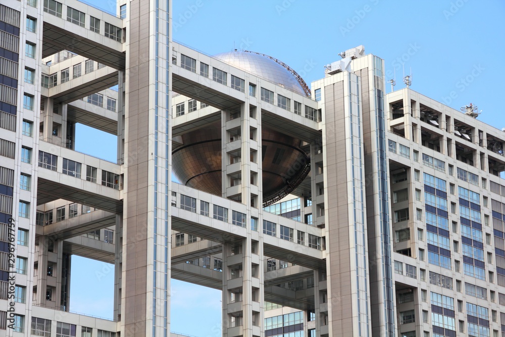TOKYO - MAY 11: People walk by Fuji TV building on May 11, 2012 in ...