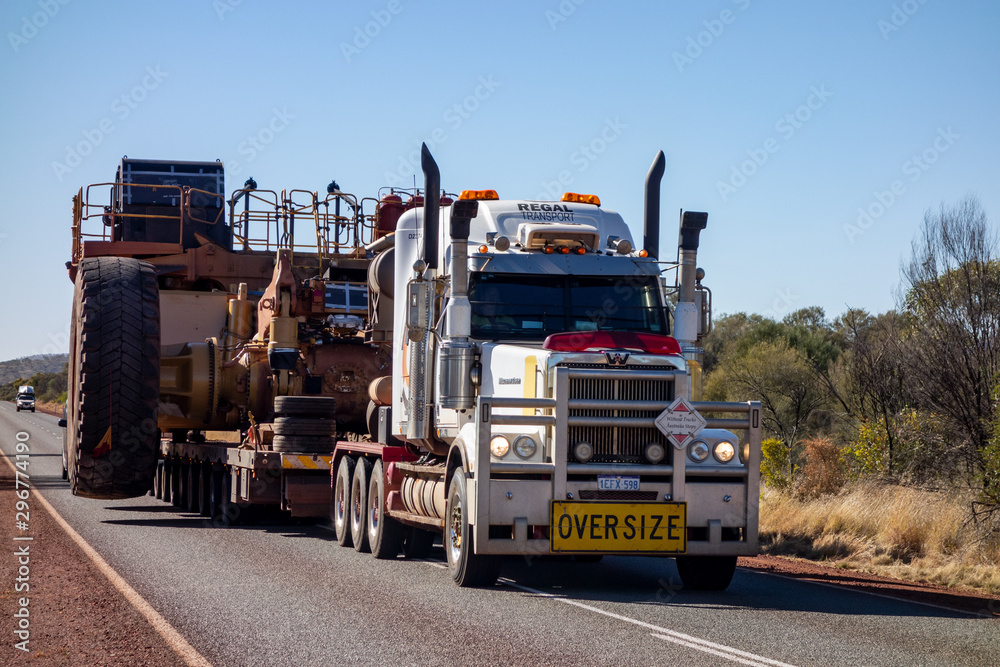 The Western Star road train with Oversize sign and extremely wide ...