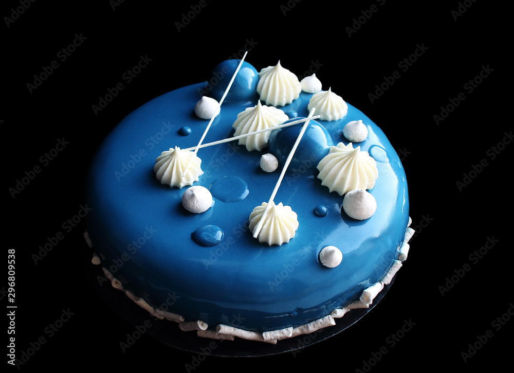 Blue shiny glazed mousse cake with white chocolate ganache topping ...