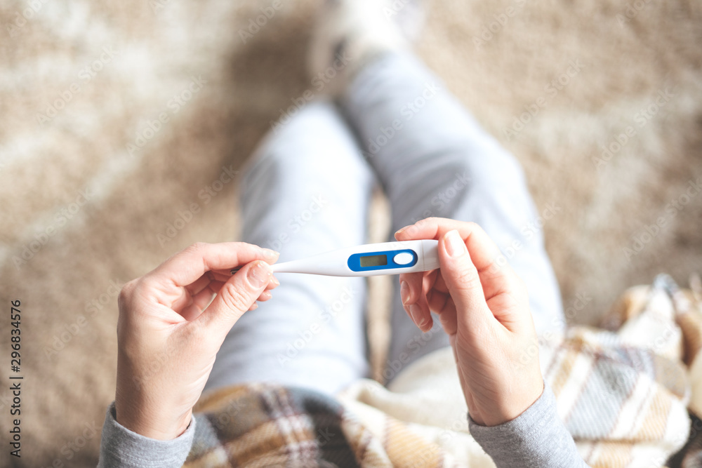 Disease. Home treatment. Flu and the common cold. A woman is sick at ...