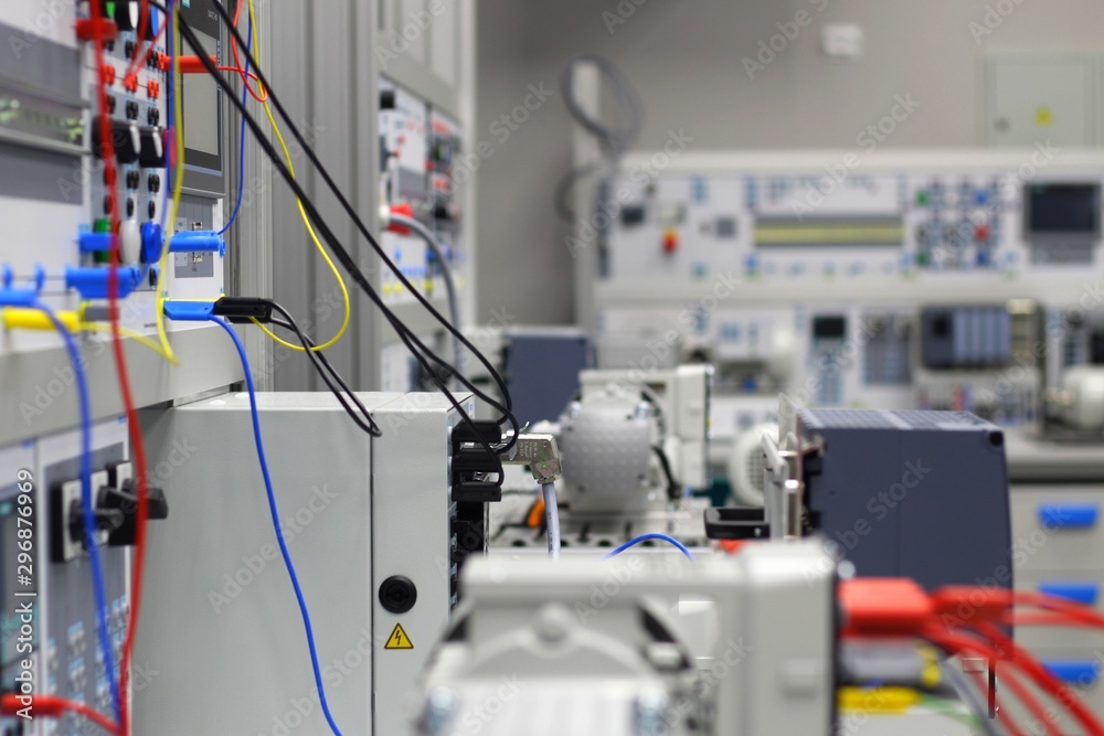 The front panel of the appliance with wires, connectors and switches ...