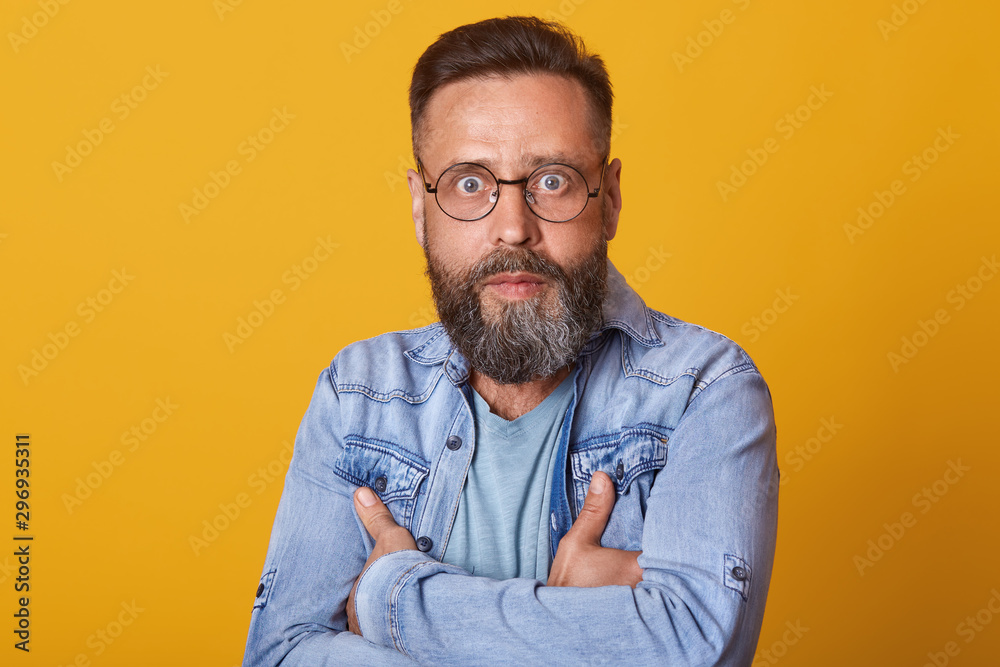 Portrait of shocked middle aged man in full disbelief. Hipster male ...
