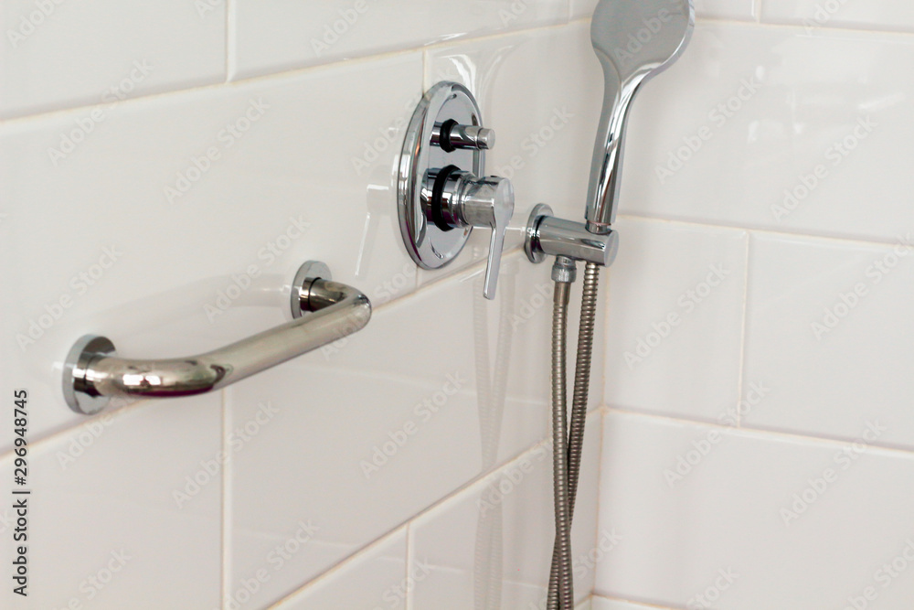 Silver metal shiny faucet shower watering can water switch in the ...