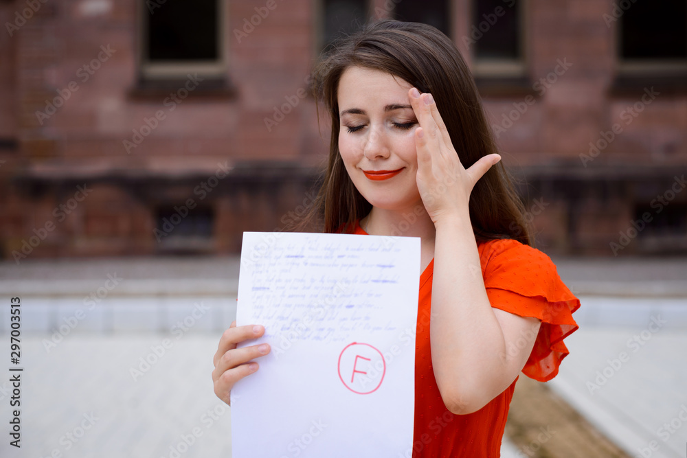 Dissapointed weeping student girl with failed test result. Concept of ...