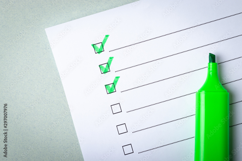Check list and green marker Stock Photo | Adobe Stock