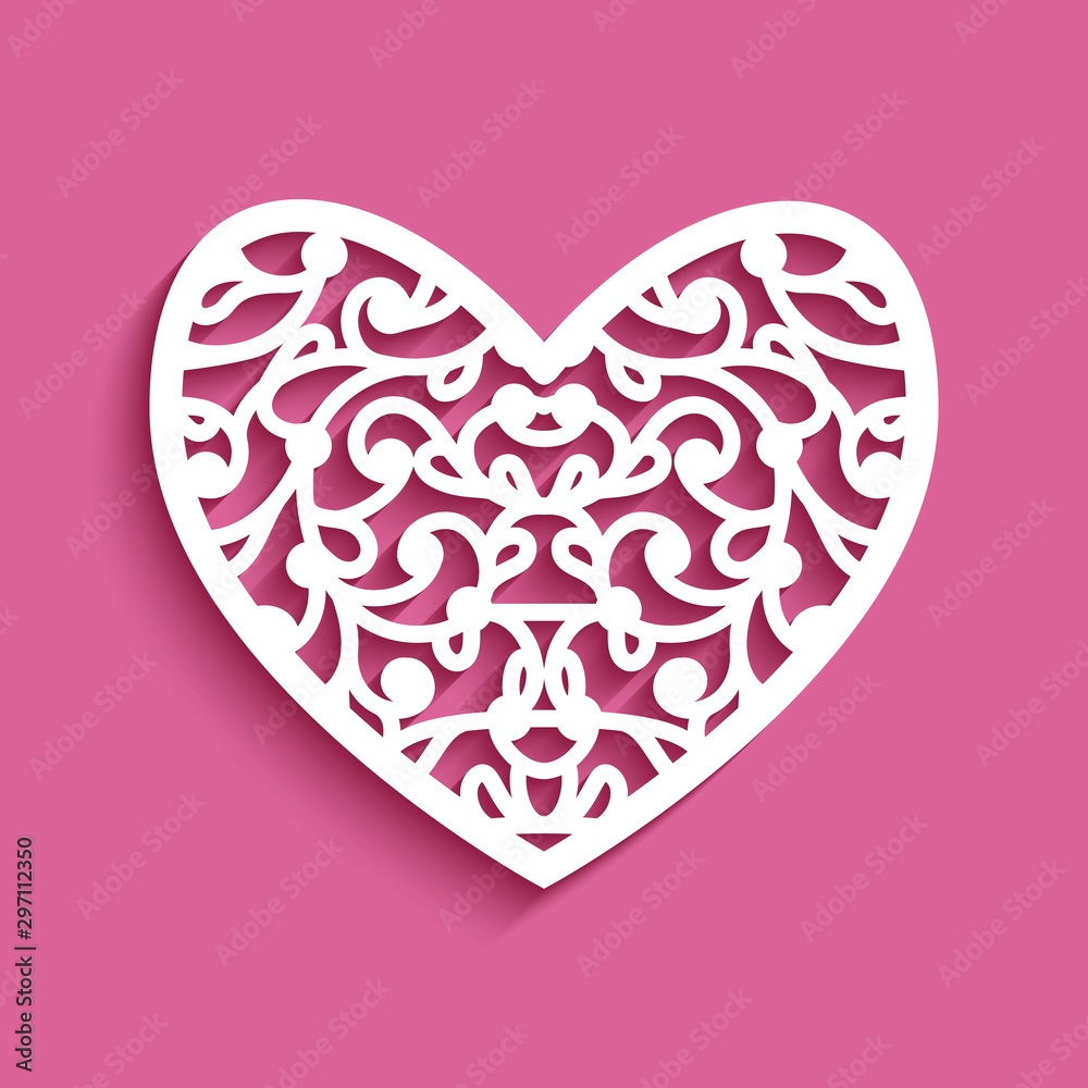 Cutout paper heart with lace ornament on pink background, stencil ...
