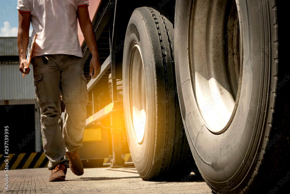 Truck driver walking around the semi truck, Truck inspection safety ...
