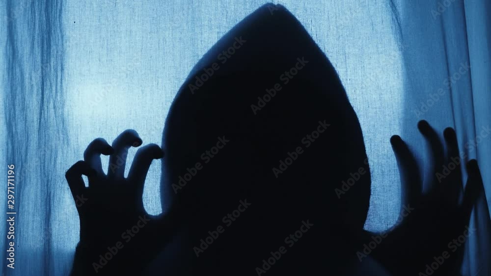 Possessed ghost scratching glass with hands, creepy person silhouette ...