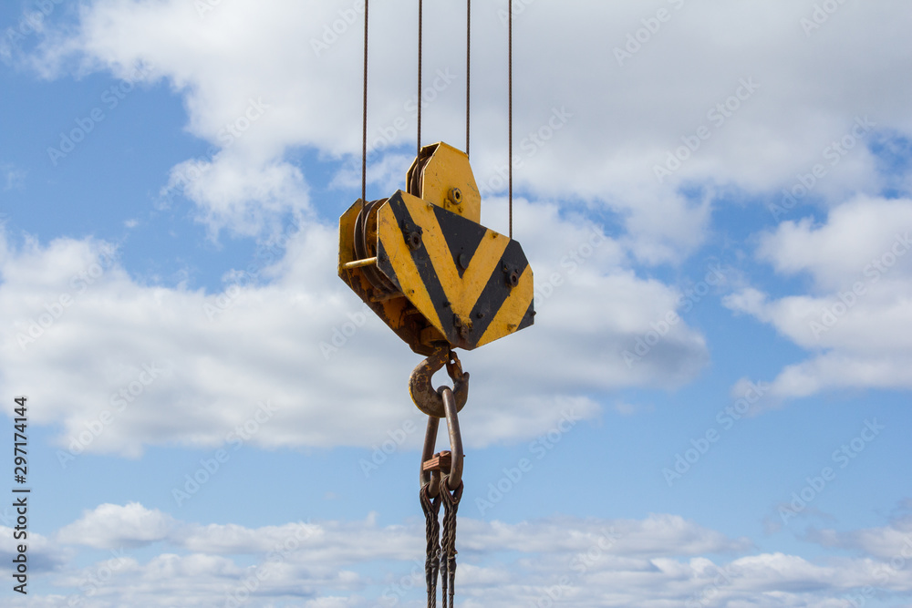 Part of the mechanism for lifting heavy loads at a construction site ...