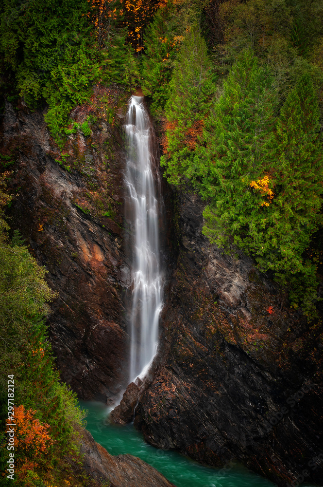 Beautiful Waterfall Behind Baker Lake Dam in the Mt. Baker National Forest. This waterfall can ...