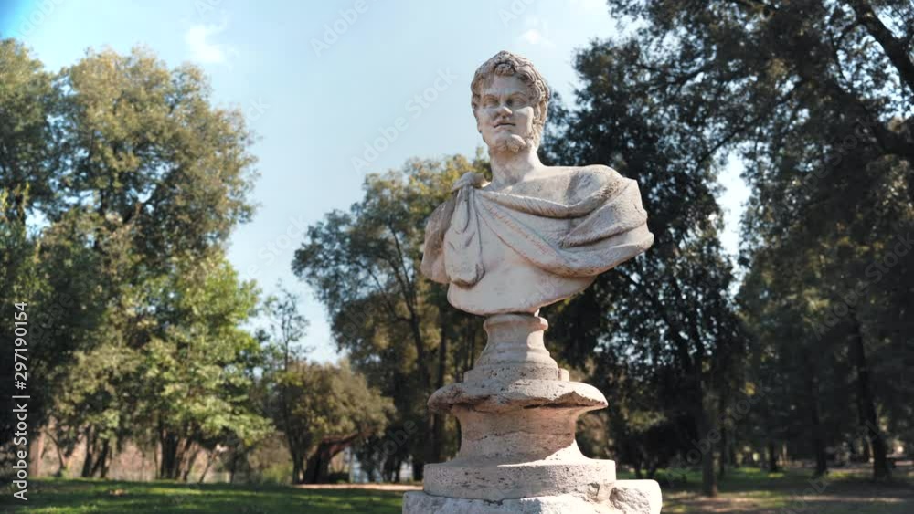 Beautiful marble statue of ancient Roman emperor in the park.Antique ...