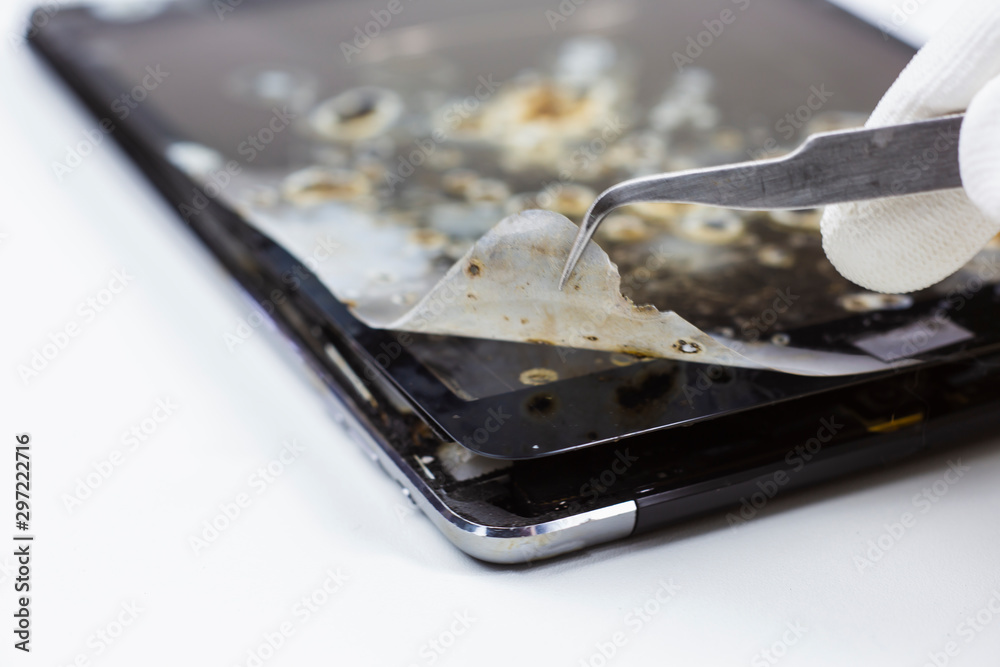 Damaged exploded tablet by overcharging, investigate by specialist ...