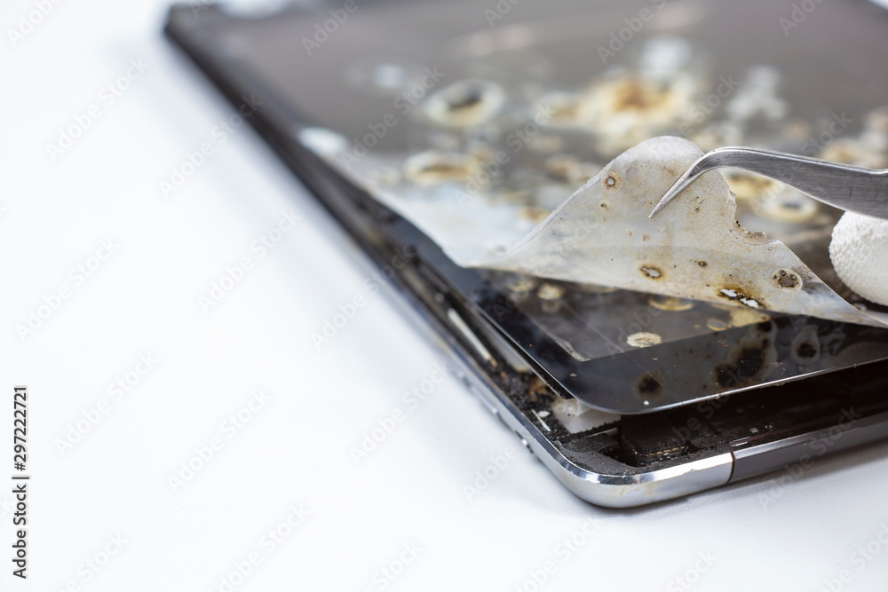Damaged exploded tablet by overcharging, investigate by specialist ...