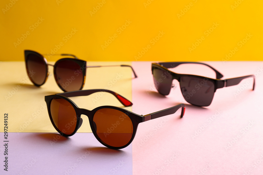 Stylish sunglasses on color background. Summer time Stock Photo | Adobe ...