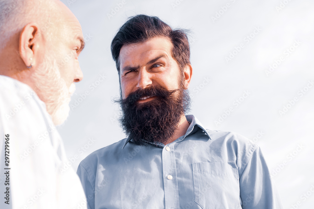 Generation of people and stages of growing up. Father and son looking ...