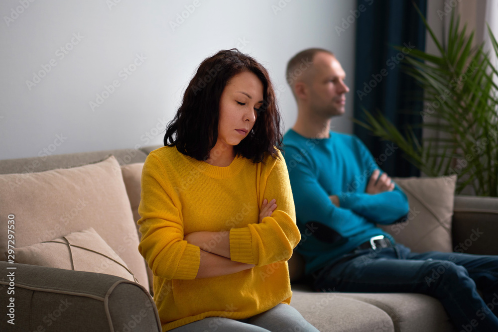 sad wife and husband, angry couple in bedroom. unhappy couple concept ...
