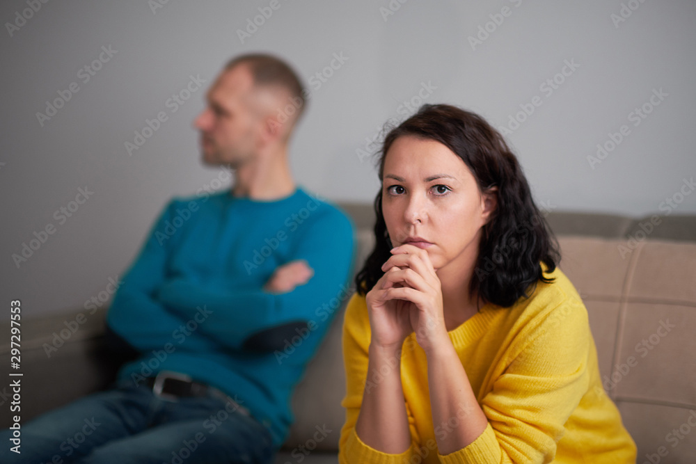 sad wife and husband, angry couple in bedroom. unhappy couple concept ...
