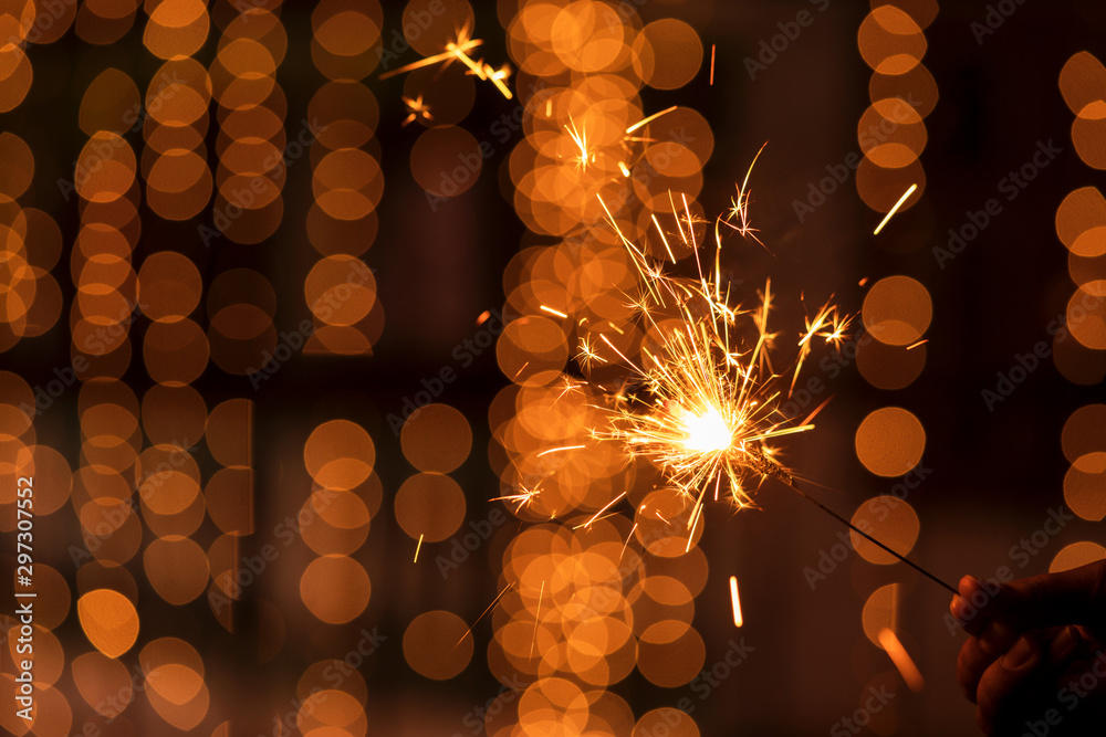 Person Holding Sparkler Celebrating Diwali. Happy Diwali - Lighting a ...