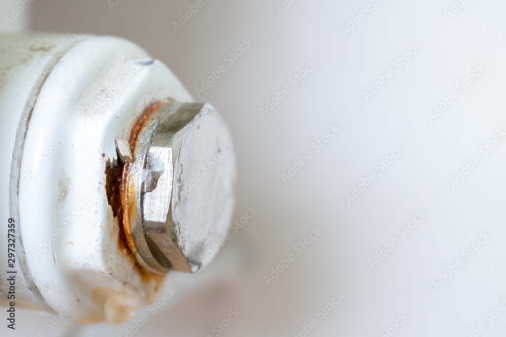 Rusty plug of a central heating radiator. Point of leakage. Stock Photo ...