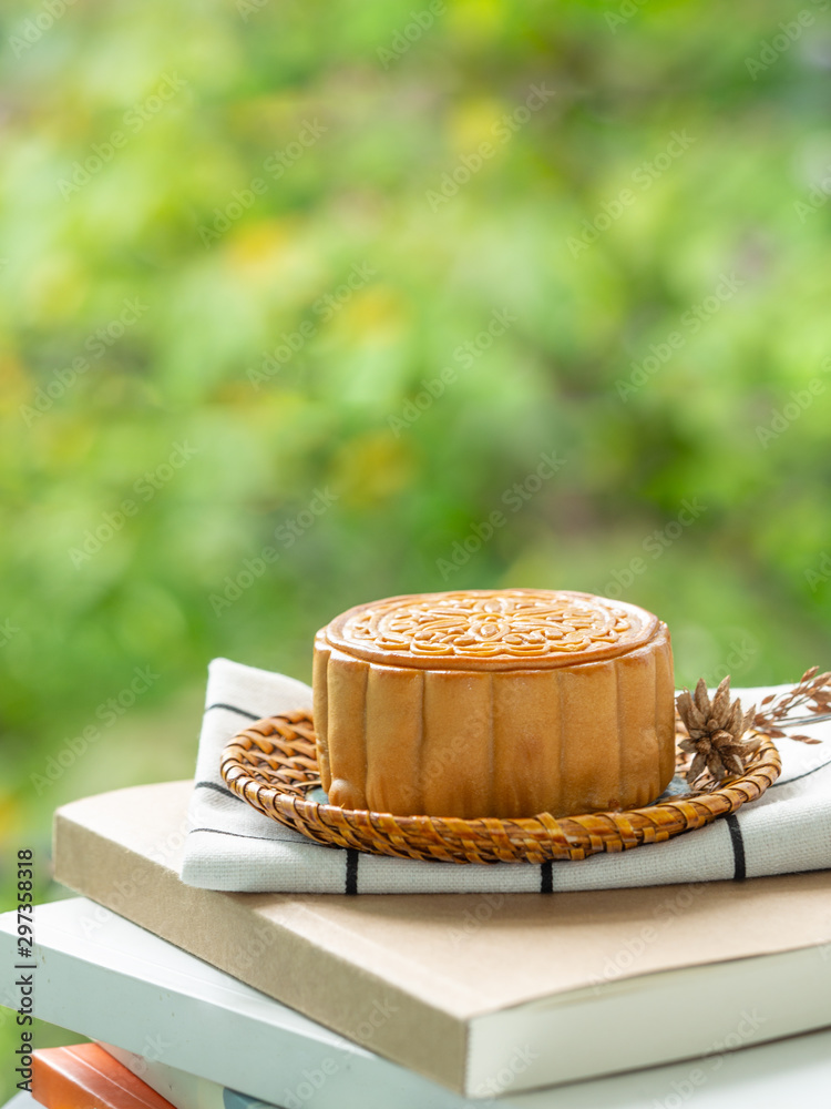 One piece of Mooncake with nature light nature background, copy space ...