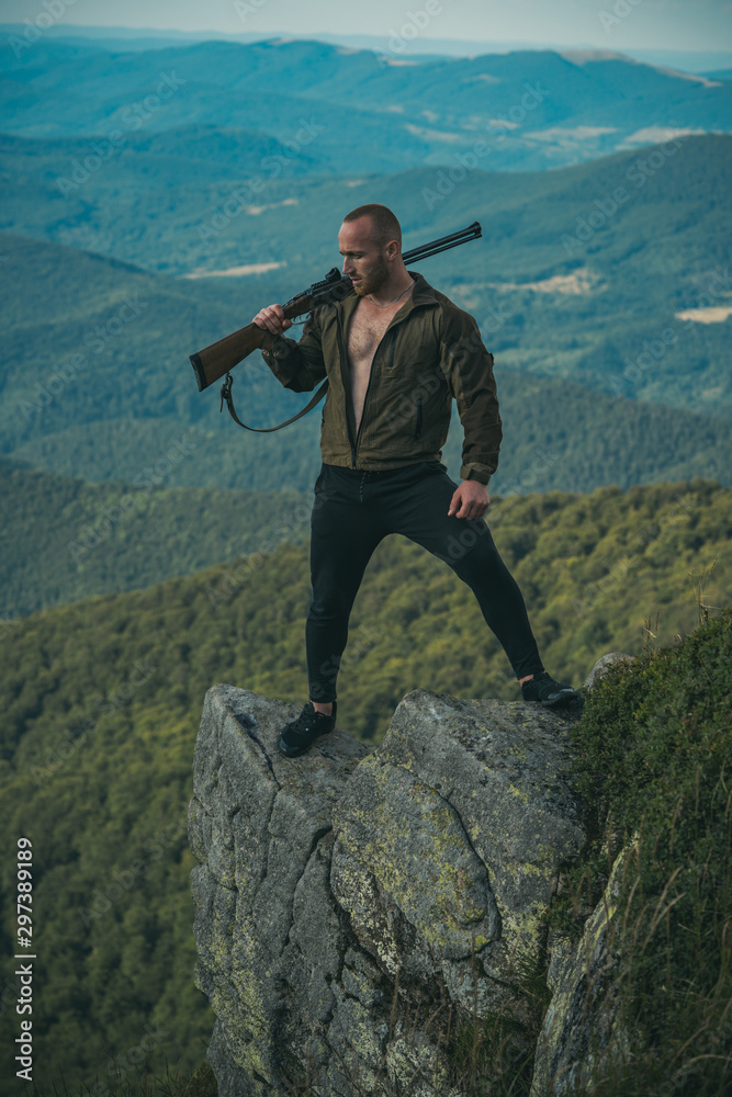 Wildlife Hunting. Hunter with shotgun gun after a hunt. Hunter with his ...