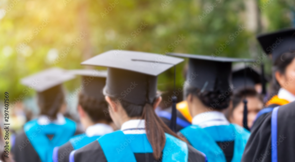 Blurred image back side view a group higher education graduation of ...