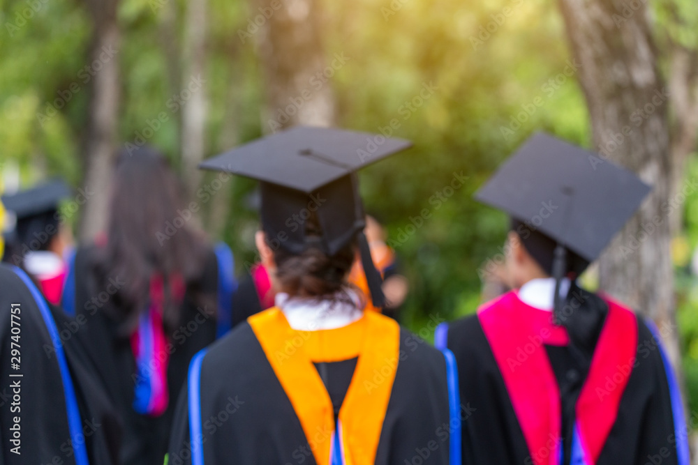 Blurred image back side view a group higher education graduation of ...