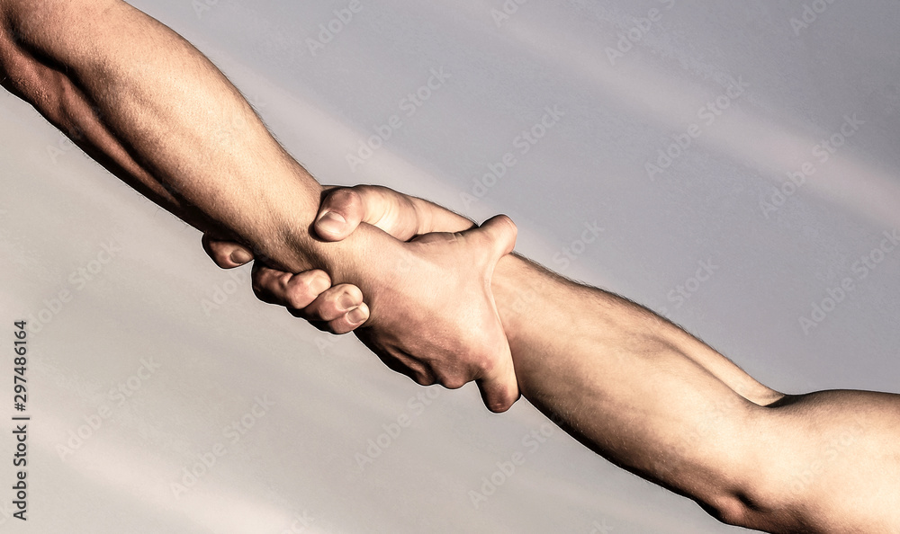 Foto de Helping hands concept, support. Close up help arm. Helping hand ...