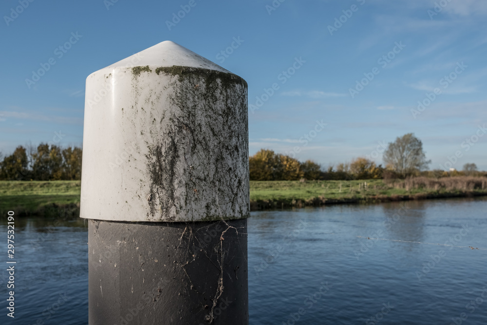Close-up of a jetty float and water level structure seen in a river ...