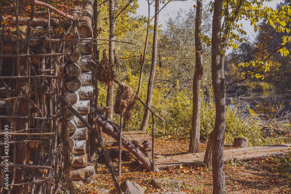 Dugout (or dug-out, pit-house, earth lodge, cellar dug) from logs in ...