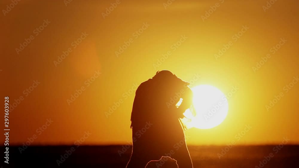 warrior with Kalashnikov at sunset day. fighter is training with a ...