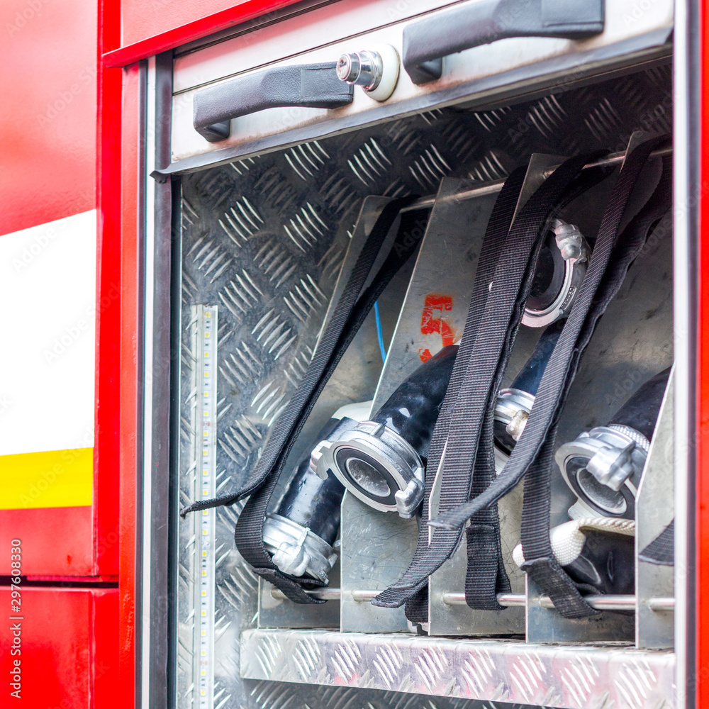 Fire engine, side view, neatly folded equipment inside the fire engine ...
