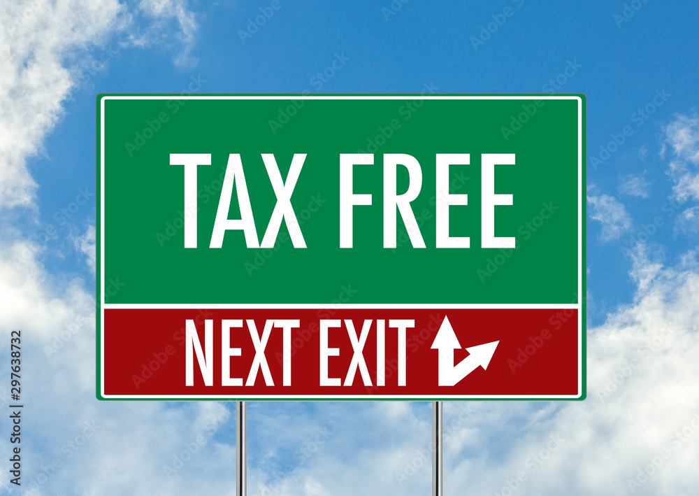 Next exit for tax free green road sign over blue sky background. Concept road sign collection ...