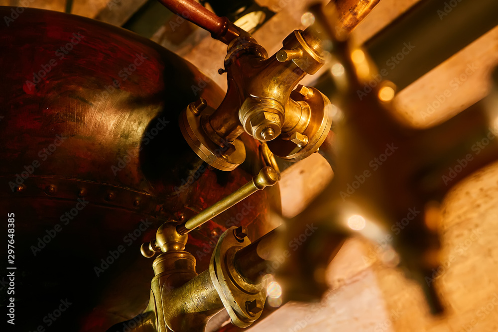 Detalis of medieval traditional distiller cube made from copper ...