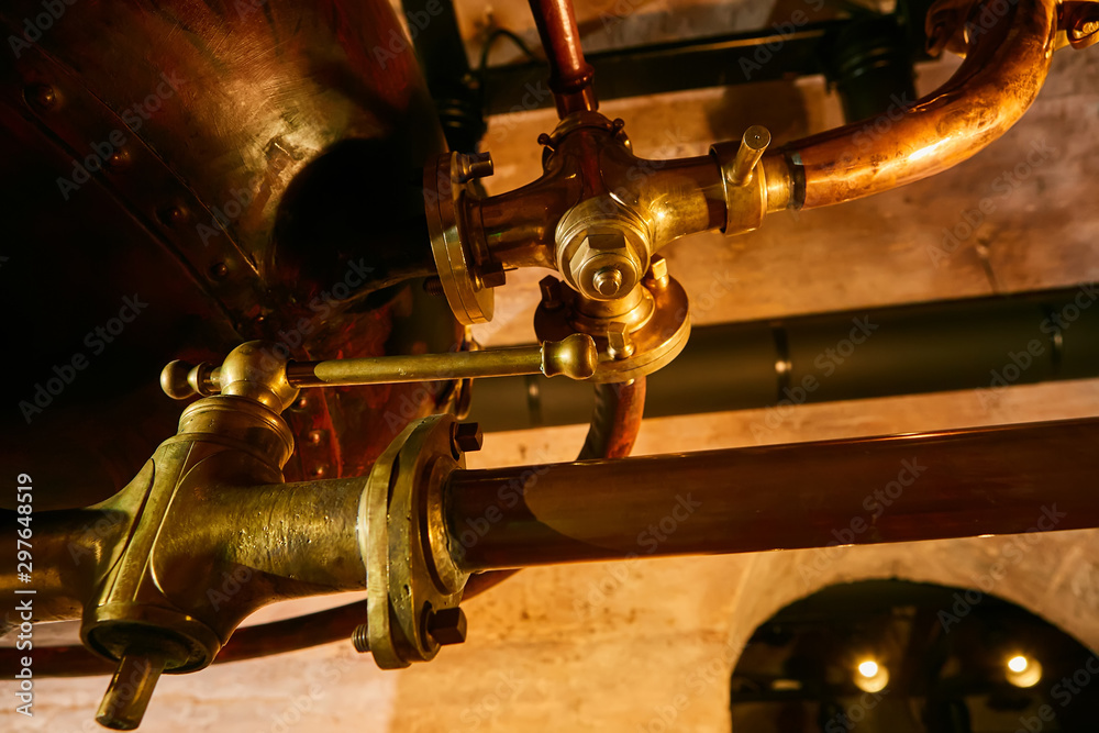 Detalis of medieval traditional distiller cube made from copper ...