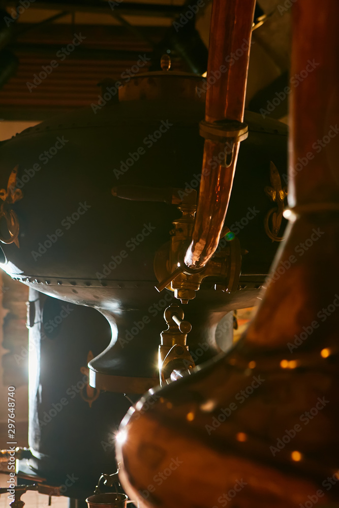 Detalis of medieval traditional distiller cube made from copper ...