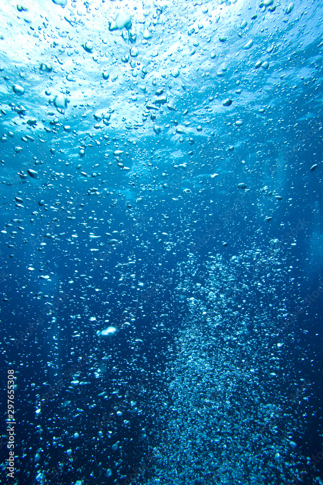 Underwater view of Bubbles from a Scuba diver ascending to the surface ...