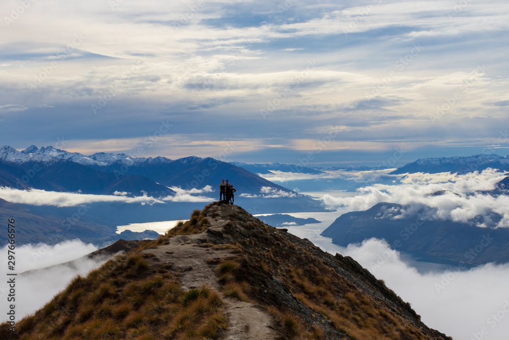 Team finish walk and hike of Roy's Peak summit New Zealand Stock Photo ...