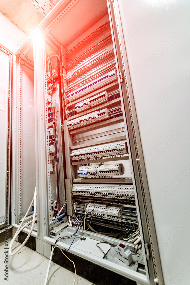 Electrical panel at a assembly line factory. Controls and switches ...