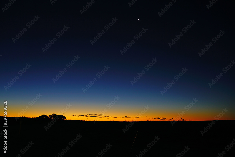 Orange and black sunset view over trees in Kalbarri National Park in ...