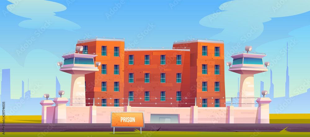 Prison building, jail fenced with strained barbed wire on high wall ...