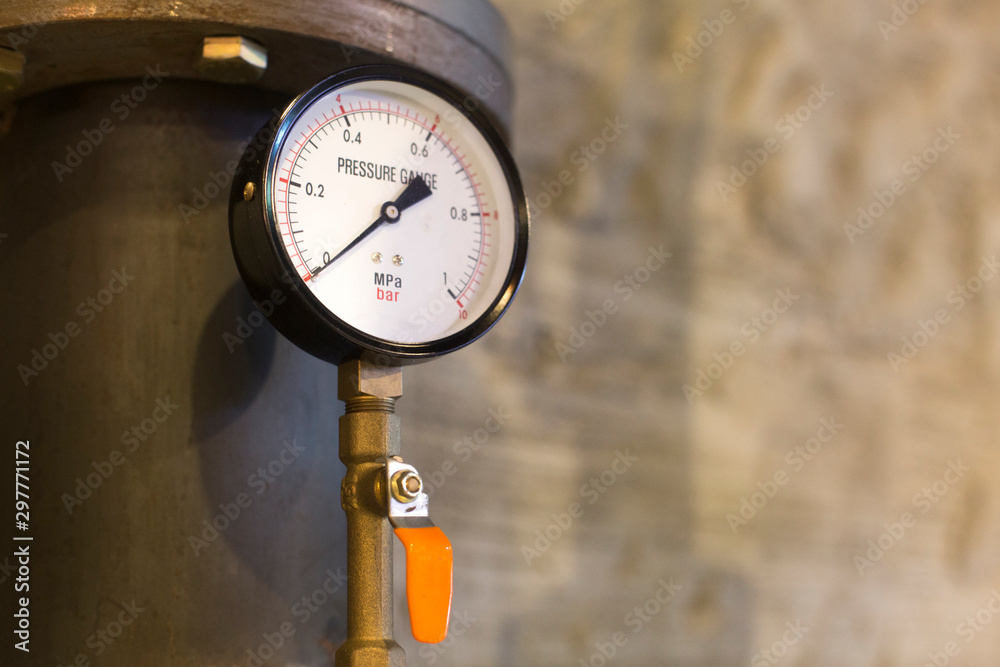 Pressure gauge in the pipeline and valves Stock Photo | Adobe Stock