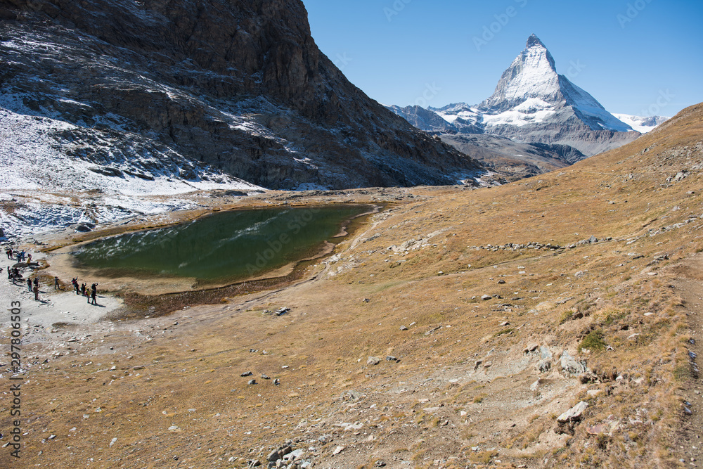 Riffelsee lake and the reflection from Matterhorn in the switzerland ...
