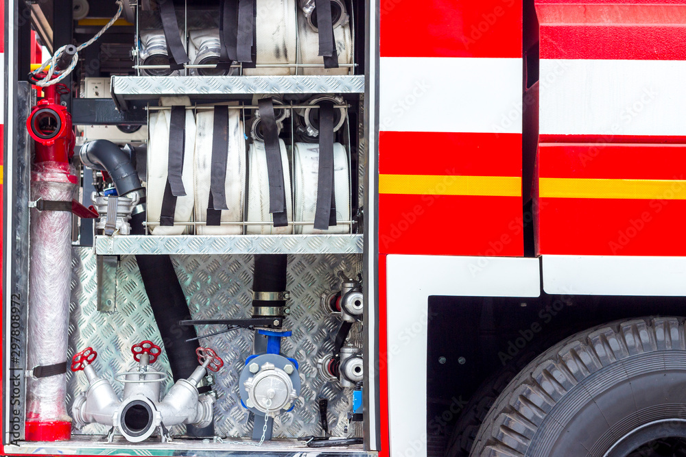 Fire engine, side view, neatly folded equipment inside the fire engine ...