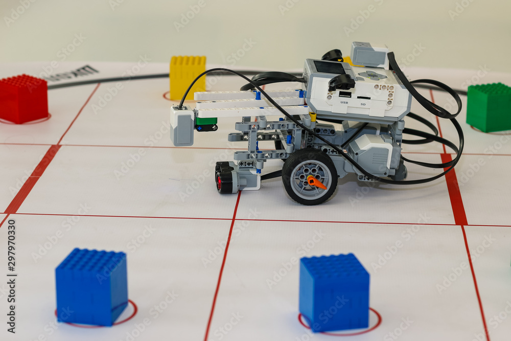 Minsk, Belarus. October, 2017. Boys construct and code robots. Lego ...