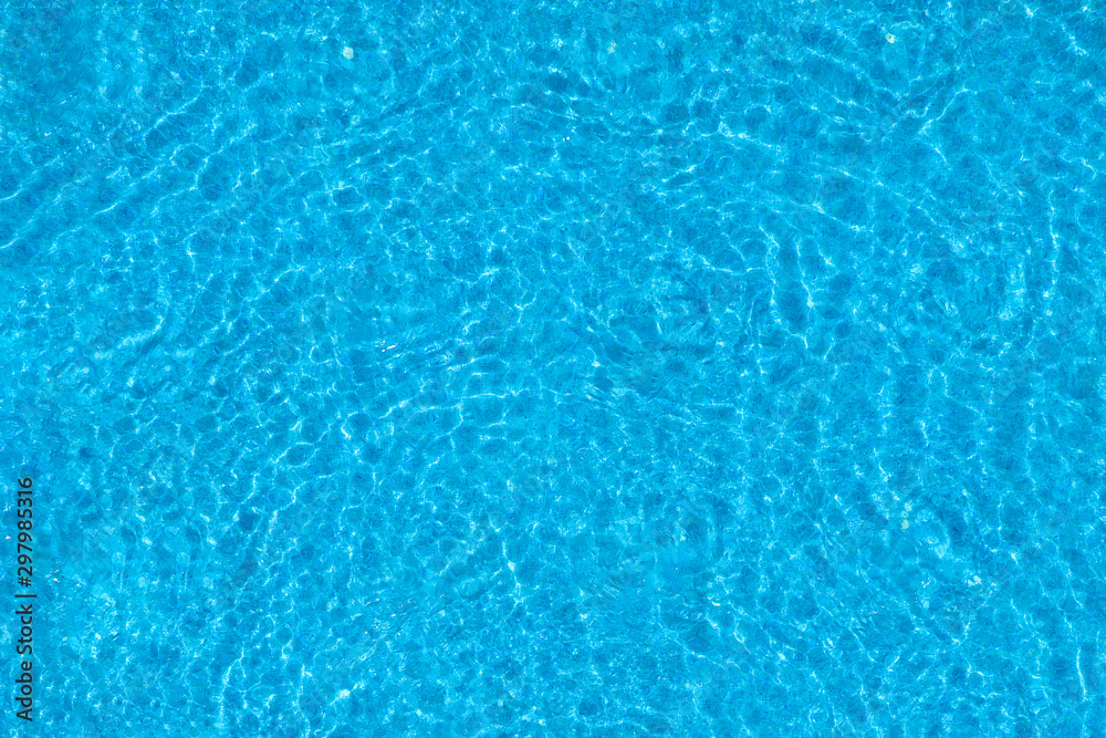 Water ripples on blue tiled swimming pool background. Top view Stock ...