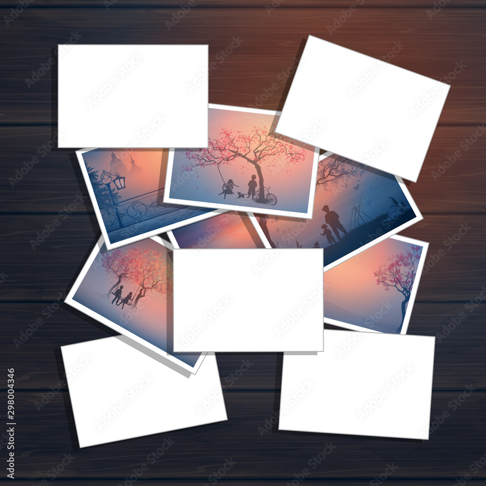 Stack of photos on wood background with empty place for inscription ...